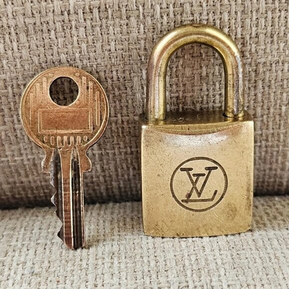 Louis Vuitton | Bags | Louis Vuitton Paris Pad Lock Gold Tone 22 ...